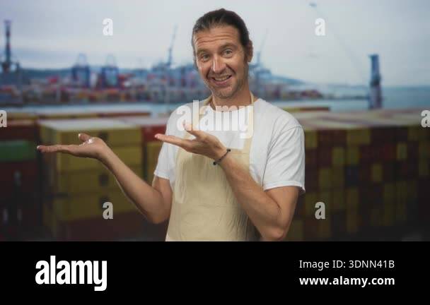 Man presenting cargo containers with open palms at port docks under ...