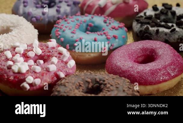 Delicious sweet donuts with different flavors and toppings including ...