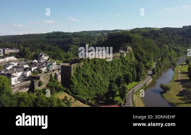 This video showcases a breathtaking aerial view of Bouillon, a charming ...