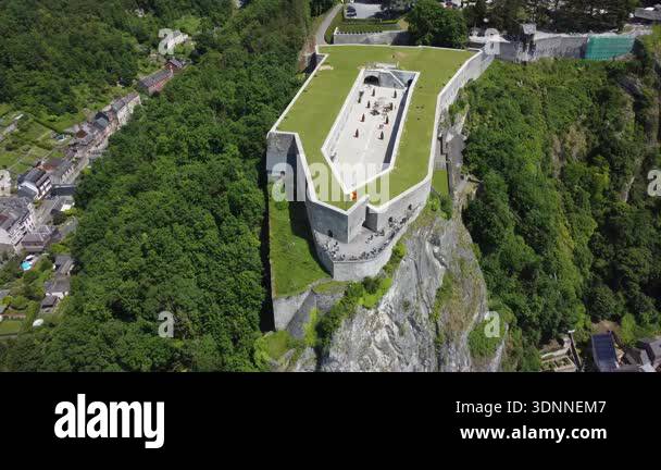 An aerial view of the Citadel of Dinant, perched atop a steep cliff ...
