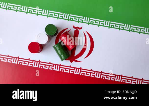 Metal barrels of oil, gas, or chemicals on the Iranian flag, Iran ...