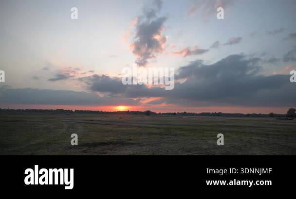 Scenic Sunset Cloudy Sky over Field. 4K 10-bit Stock Video Footage - Alamy