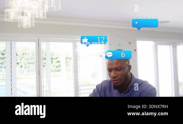 Man seeing notification typing on laptop in kitchen showing social ...
