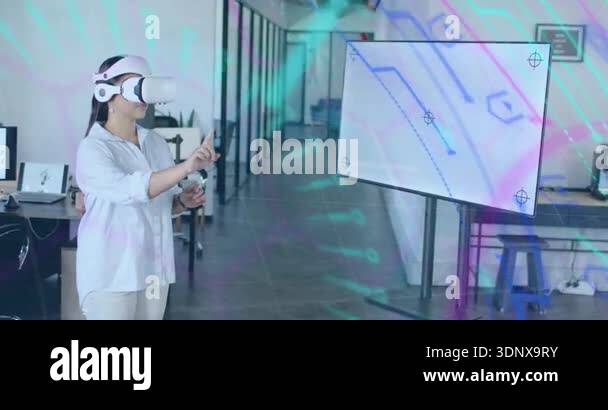 Woman wearing VR headset tapping screen and adjusting holographic ...