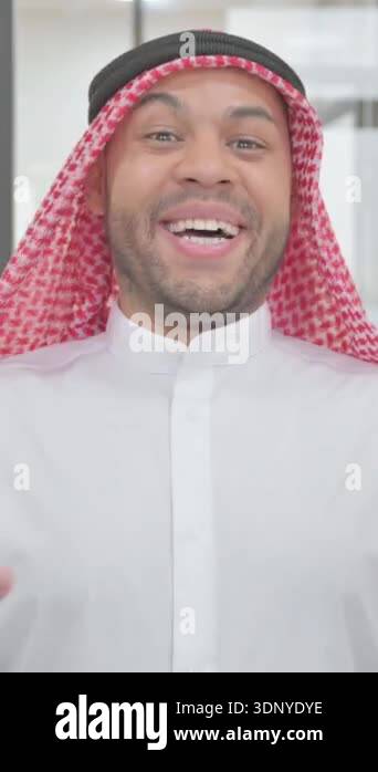 Portrait of Young Muslim Man Celebrating Success, vertical video Stock ...