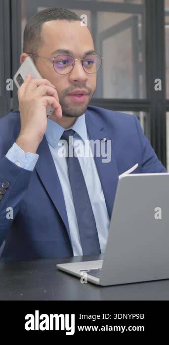 Vertical, Man in Suit Talking on Phone Stock Video Footage - Alamy