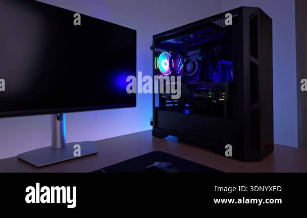 Cinematic pan highlighting stylish gaming pc build, rgb lighting ...