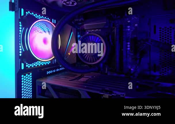 Wide angle slow motion view of gaming computer interior, showcasing rgb ...