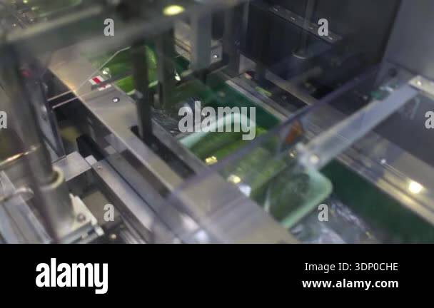 Packaging machine for cucumber at factory Stock Video Footage - Alamy