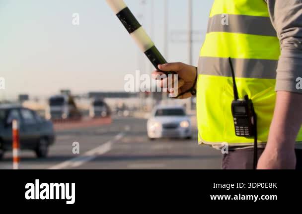 Traffic police with Traffic rod isolated and walkie talkie work at ...