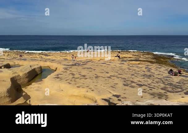 Sliema, Malta - February 8, 2026: People enjoying a sunny day on the ...