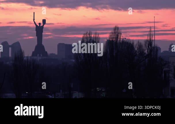 Majestic silhouette of the Mother Ukraine monument standing against a ...