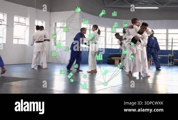 judo students doing grip drills as instructor stepping initiating ...