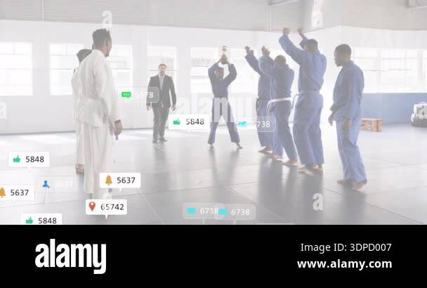 Judo team lifting trophy while social media counters multiplying across ...