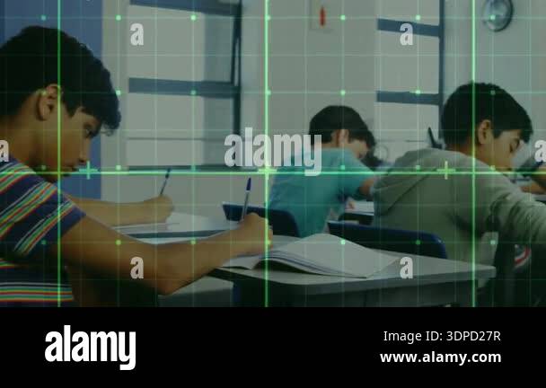 Camera panning right revealing students completing class assignment at ...