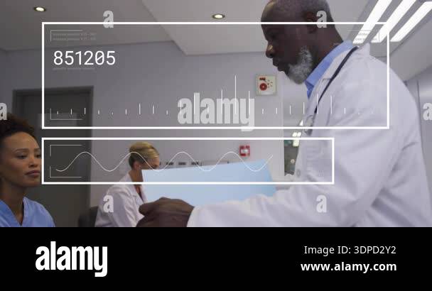 Doctor entering clinic reception and opening file before handing blue ...