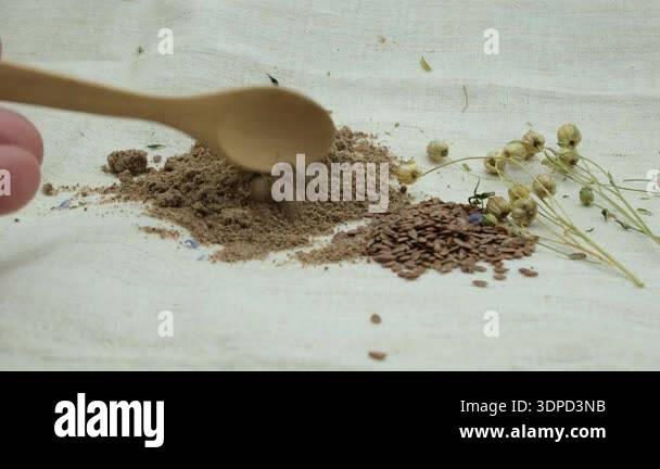 Flaxseed Flour in a Spoon. Flax Seeds on Linen Canvas. Dried Flax Seed ...