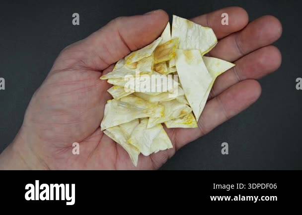 Many delicious chips potato on grocery market counter, tasty organic ...