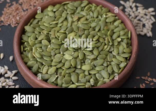 Shelled pumpkin seed kernels, salted, roasted, or raw, are a healthy ...