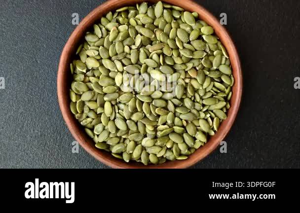 Shelled pumpkin seed kernels, salted, roasted, or raw, are a healthy ...