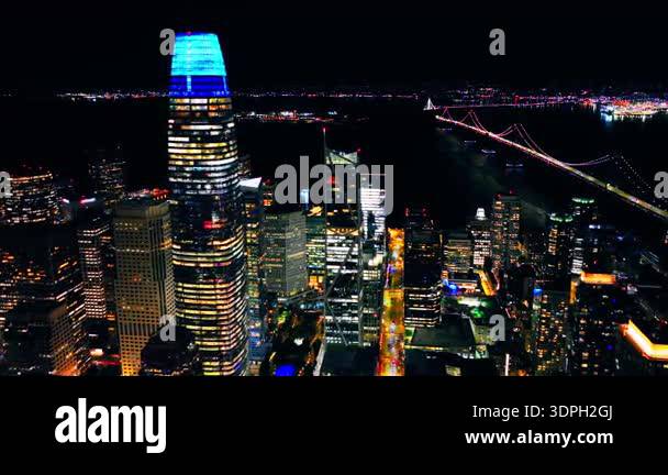 Aerial night view of San Francisco skyline featuring the illuminated ...