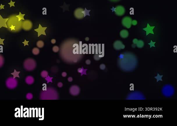 Animation of colorful lights and stars moving on black background ...
