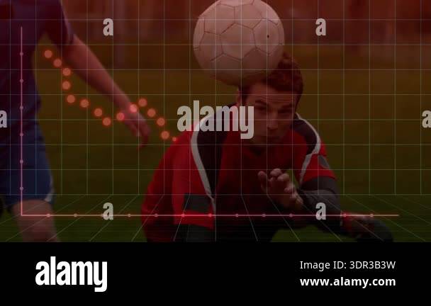 Teenage player striking ball initiating trajectory overlay goalkeeper ...
