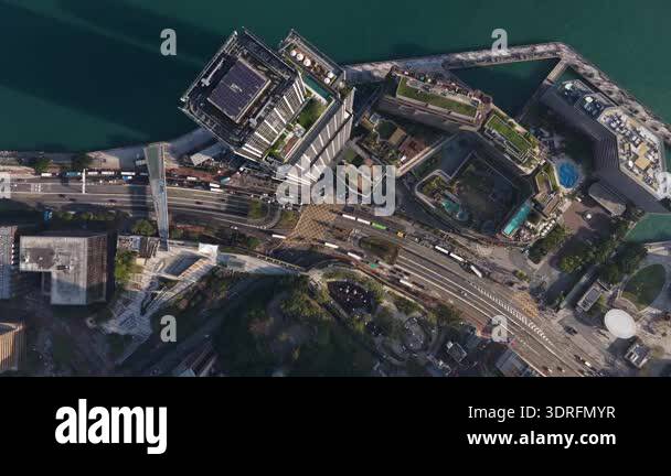 High angle top down drone shot showing the bustling highway traffic and ...