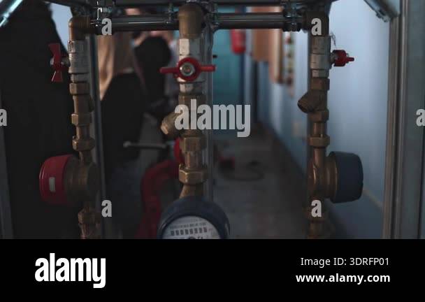 Plumber training workshop at a university. Close-up stand with ...