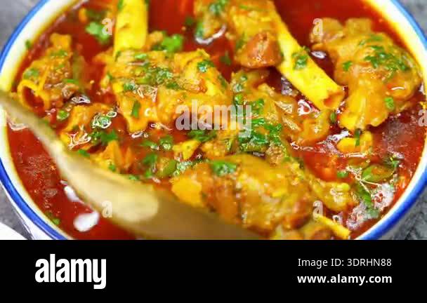 Traditional mutton bone marrow curry prepared with tender marrow pieces ...