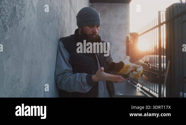 Man Leaning Against Wall Catch Breath After Intense Work. Male Removes ...