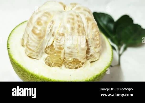 The inside of the pomelo looks juicy and vibrant Stock Video Footage ...