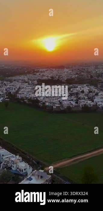 Golden Hour Aerial Cityscape of Indian City at Sunset. Vertical Video ...