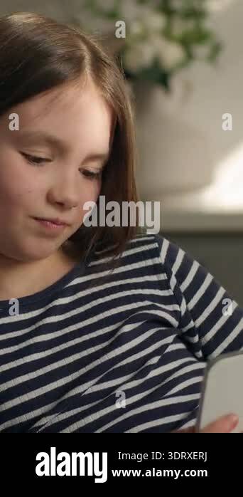 Caucasian little girl child kid daughter swiping screen touchscreen of ...