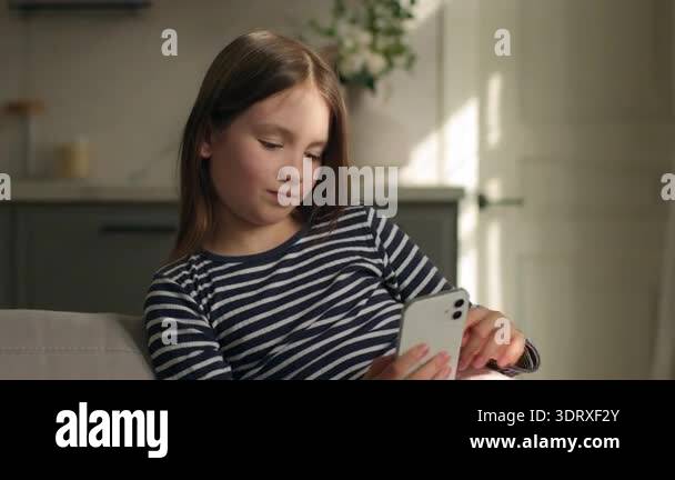 Caucasian little girl child kid daughter swiping screen touchscreen of ...