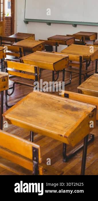 Animation of white question mark over chairs and desks in empty school ...