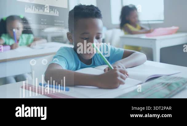 Boy picking up pencil and writing at classroom desk while animated ...