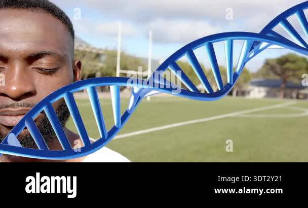 Man standing on field opening eyes and smiling as blue 3D helix ...