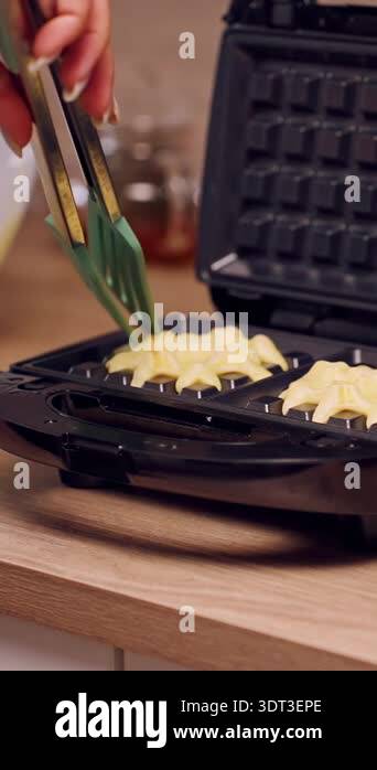 Vertical video. Slow Motion Close Up Of Woman Carefully Flipping Fresh ...