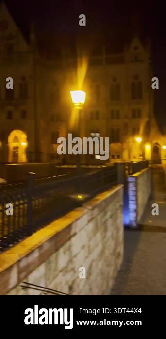 The video shows a walk along the river in Budapest at night ...