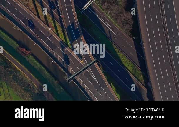 An overhead drone view of fast moving traffic on the Spaghetti Junction ...