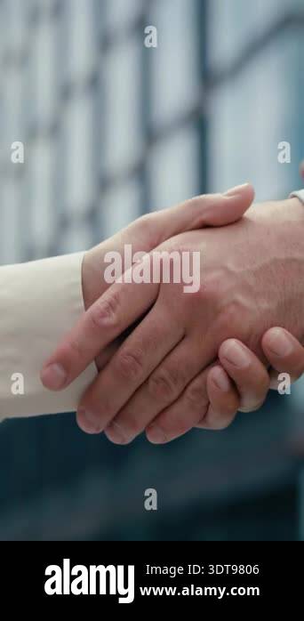 Business partners handshake meeting deal in city multiracial ...