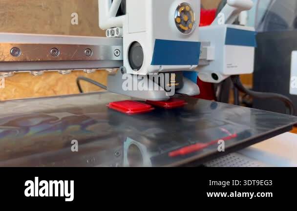 Modern 3d printer creating a physical object from a digital model using ...