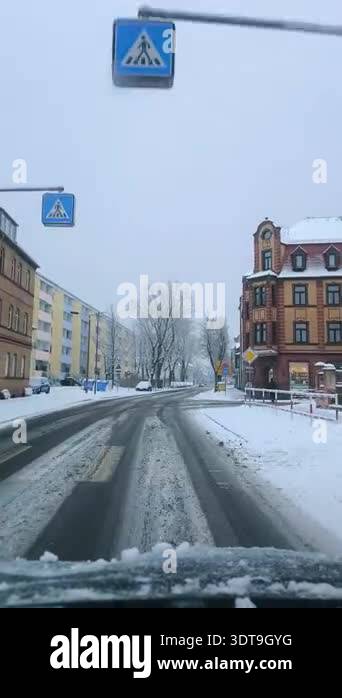 Bitterfeld, Germany - February 17, 2026: A view from a car of a snow ...