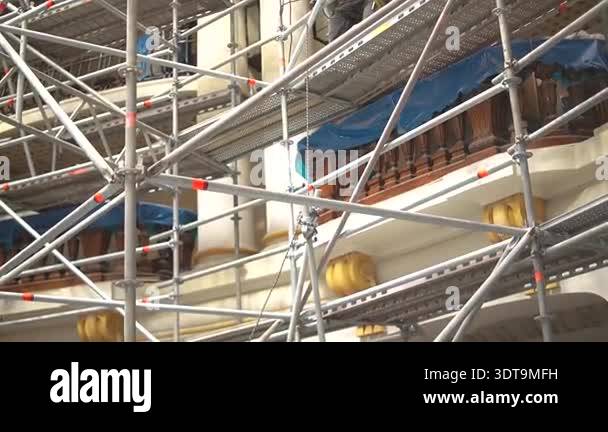 Worker receiving metal construction materials at building site Stock ...