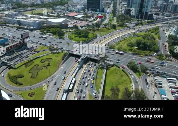 Aerial drone view of Javier Prado bridge crossing Via Expresa in Lima ...