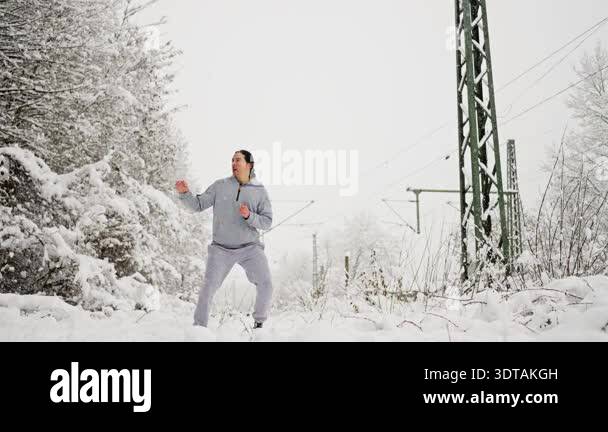 Performing Quick Footwork And Dodging Techniques On Snowy Terrain ...