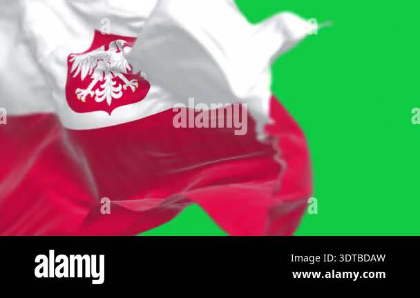 Close-up of Poland national flag waving in the wind isolated on green ...
