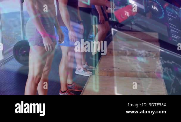 Four athletes on trainer cue performing box jumps for fitness routine ...