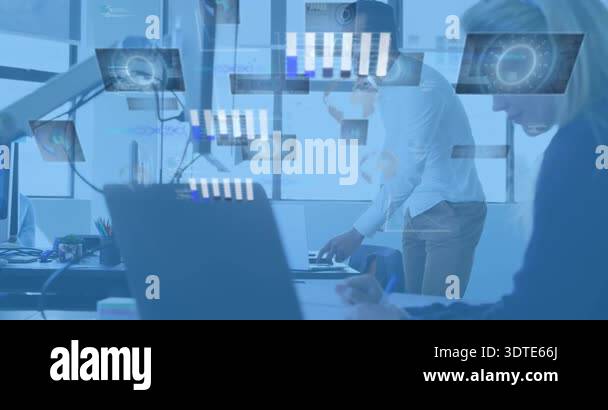 Data analyst standing upright activating animated charts around monitor ...